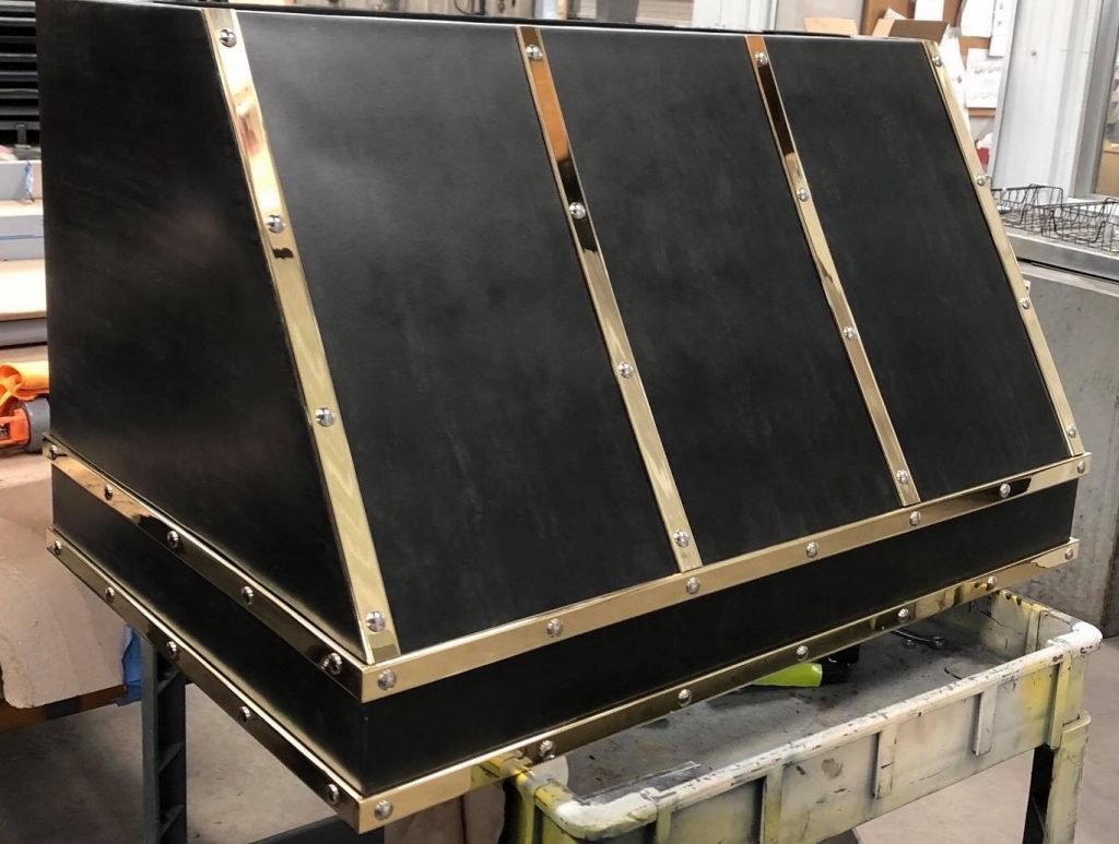 Recently completed zinc hood with polished brass and stainless steel ...