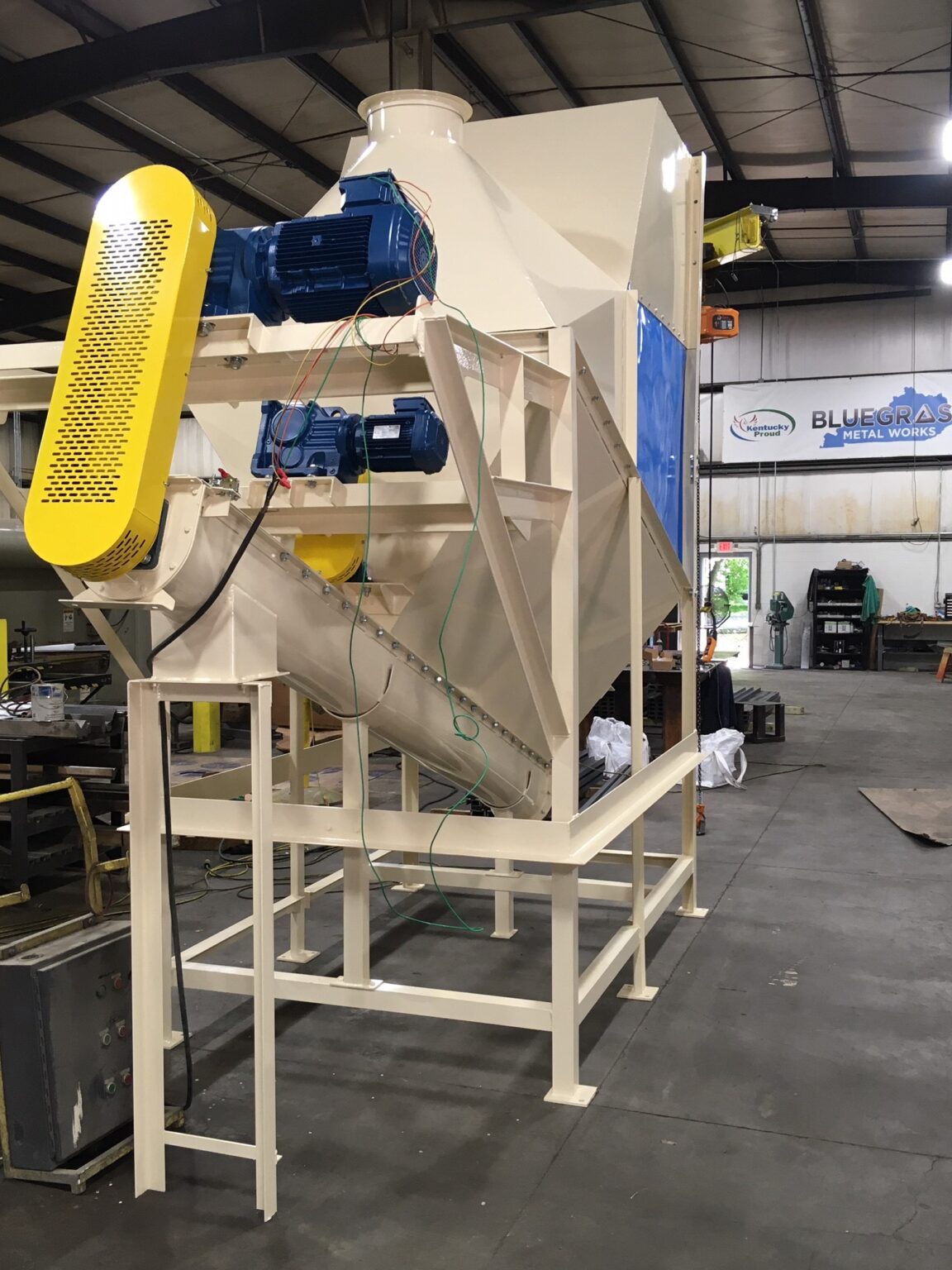 Carbon steel screw feeder hoppers ready for shipment - Bluegrass Metal ...